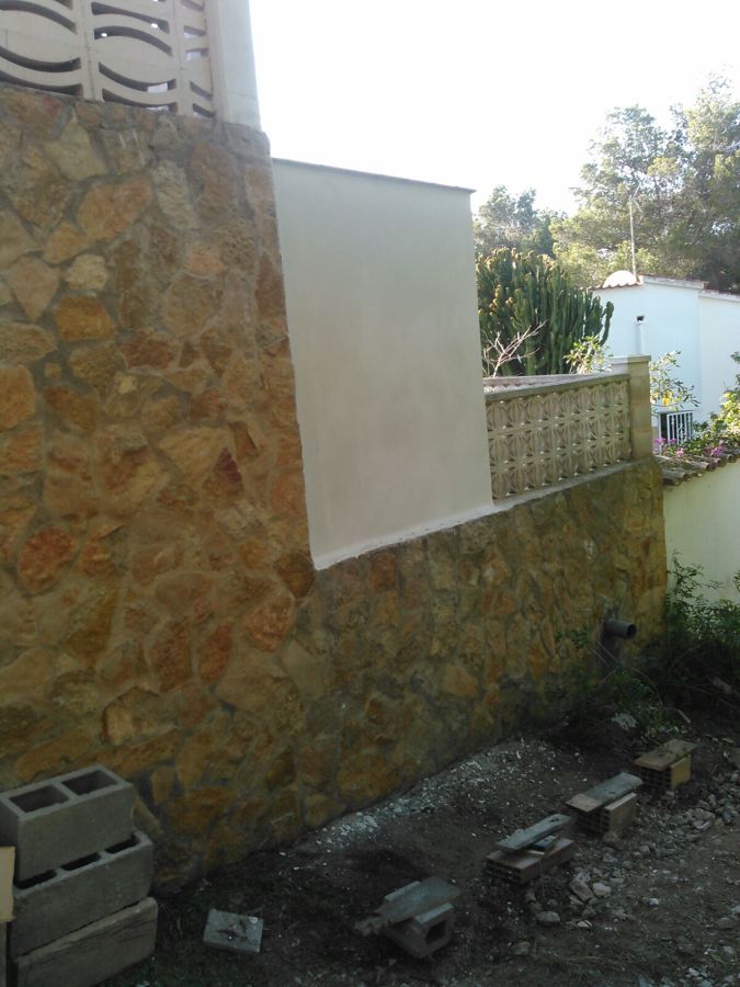 Foto: Pared de Piedra y Enlucido de Mortero Fino de PG Reformas ...